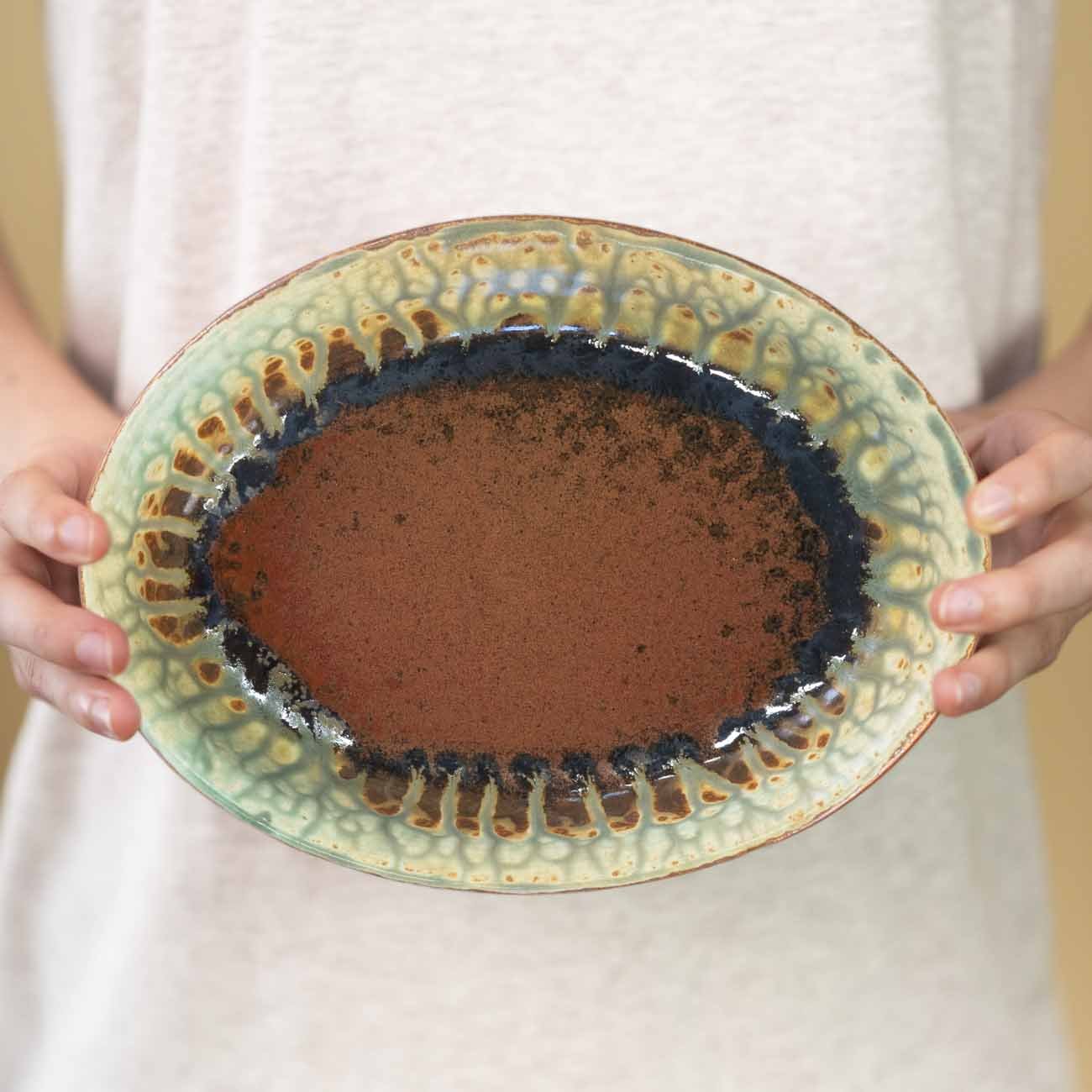 Shop Rustic Red Oval Ceramic Snack Plate