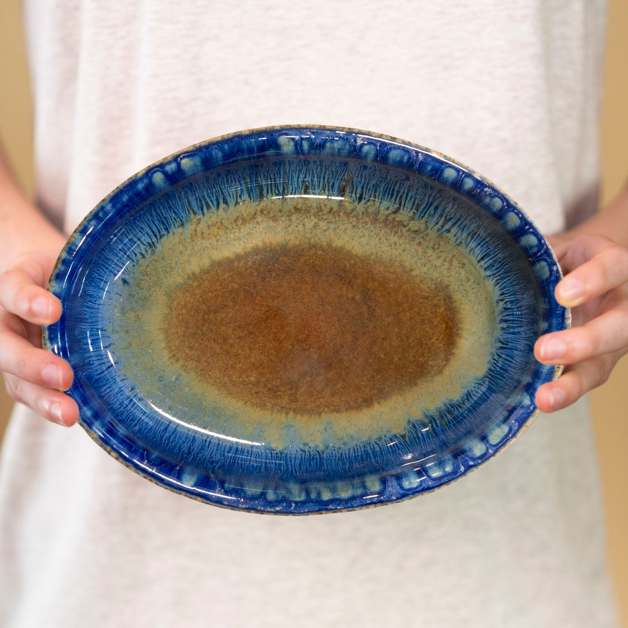 Shop Amber Blue Oval Ceramic Snack Plate